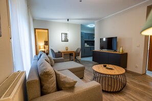 Apartamento Empresarial | Sala de estar | Smart TV 
