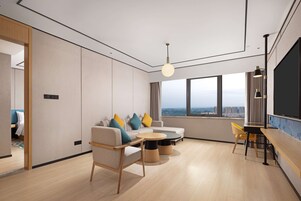 Suite Deluxe, 1 cama king-size | Sala de estar
