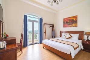 Suite Superior | Minibar, secretária, cortinas/cortinados opacos, quartos insonorizados 