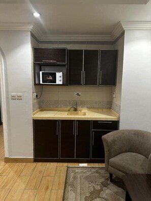 Quarto casal luxo | Cozinha privada