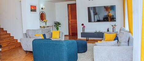 Apartamento Deluxe | Sala de estar