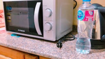 Apartamento Deluxe | Micro-ondas