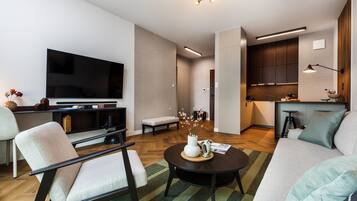 Apartamento luxo, 1 quarto, para não fumantes, vista para a cidade | 1 quarto, roupas de cama premium, escrivaninha, cortinas blackout