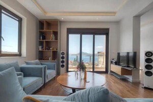 Apartamento Comfort | Sala de estar | Televisor LCD de 32 polegadas com canais por cabo 