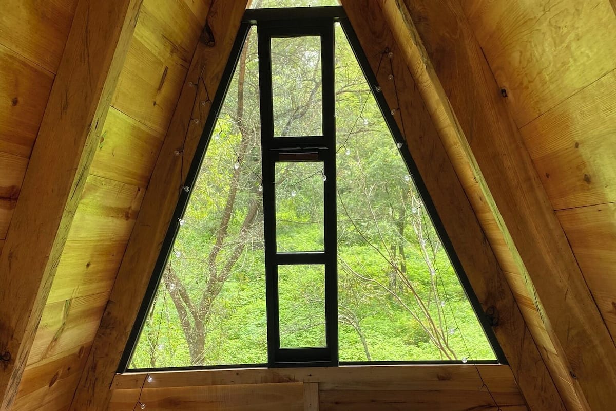 Cabana romântica | Edredons de pluma, camas Tempur-Pedic, cortinas blackout