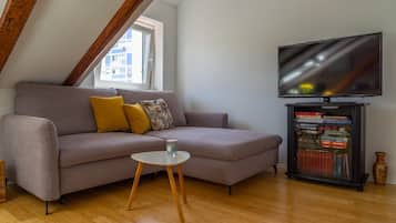 Apartamento (Apartman) | Área de estar | TV de tela plana 82 cm com canais a cabo