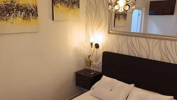 Habitación Deluxe doble (1) | 1 quarto, ferro/tábua de engomar, Wi-fi grátis, roupa de cama fornecida