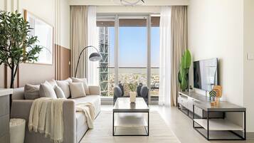 Apartamento elite | Área de estar | TV LED 43 polegadas com canais a cabo