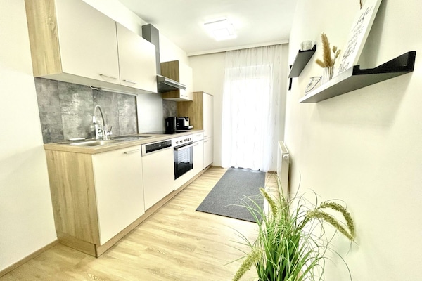 Apartamento Deluxe | Cozinha privada | Uma máquina de café expresso, uma cafeteira/bule, uma chaleira elétrica