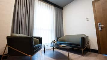 Junior Suite City View | Roupas de cama premium, frigobar, cofres nos quartos