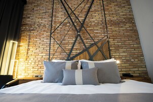 Quarto Duplo Deluxe | Roupa de alta qualidade, minibar, cofre com capacidade para portátil 