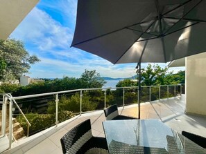 Apartamento panorâmico | Vista para o jardim