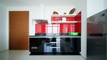 Apartamento | Cozinha privada | Um frigorífico/congelador grande, uma placa de cozinha