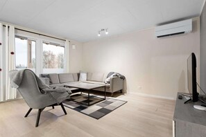 Apartamento | Área de estar | TV