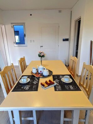 Apartamento superior | Área de estar