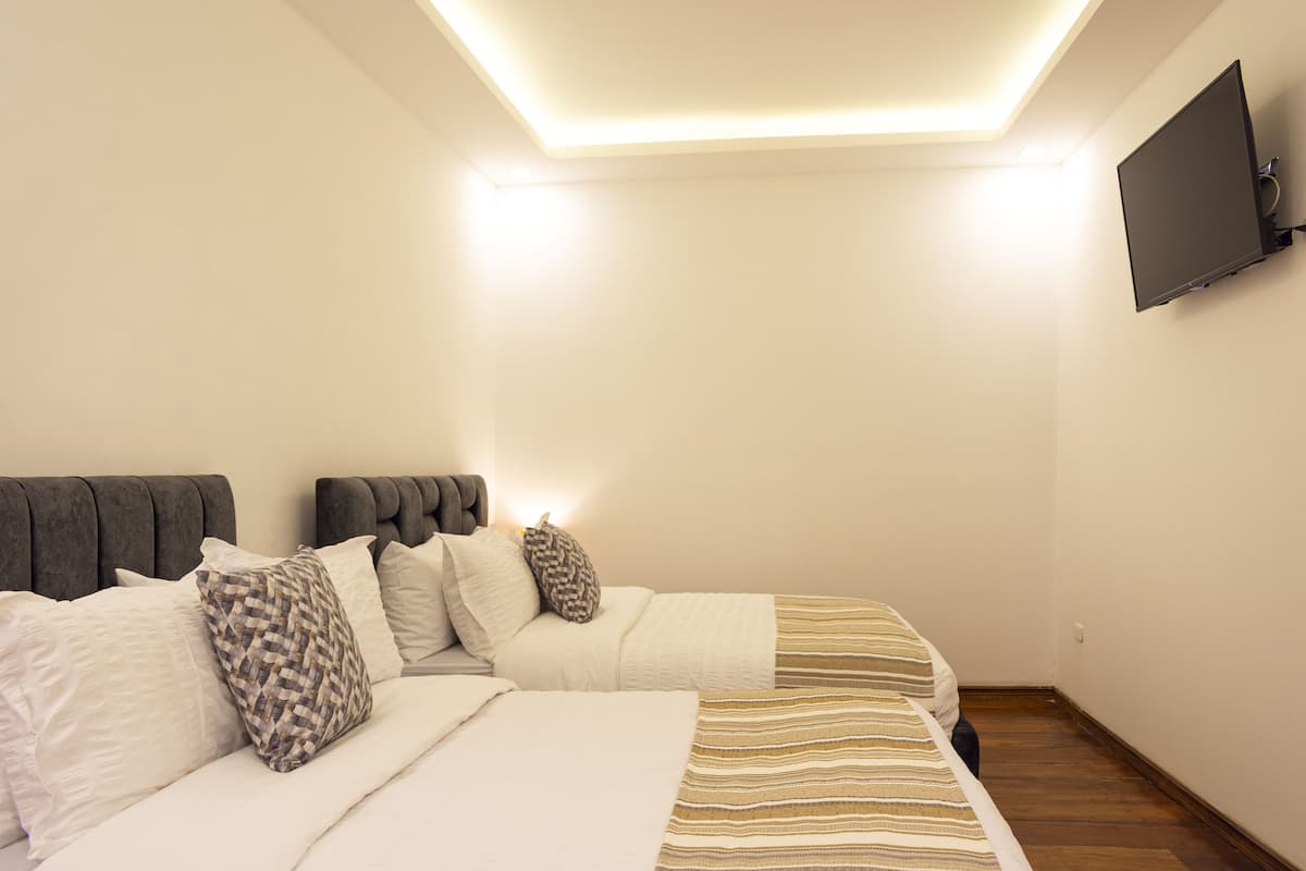 Suíte família | 1 quarto, escrivaninha, Wi-Fi de cortesia, roupa de cama