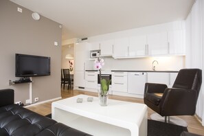 Apartamento empresarial | Quartos à prova de som, ferros/tábuas de passar roupa, Wi-Fi de cortesia