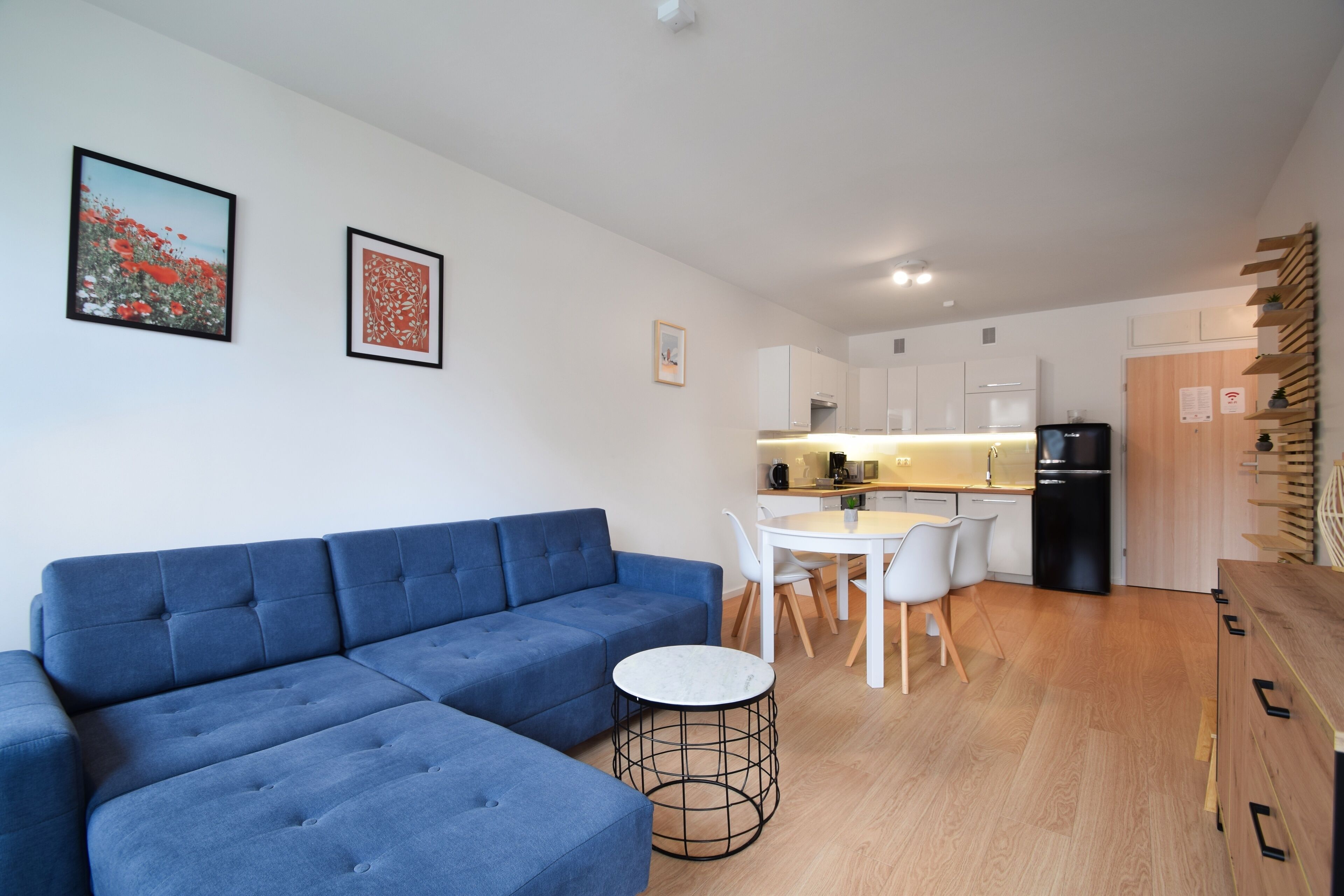Apartamento conforto | Área de estar | TV de tela plana 37 polegadas com canais digitais