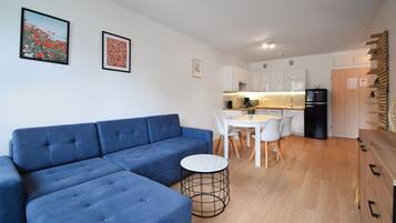 Apartamento conforto | Área de estar | TV de tela plana 37 polegadas com canais digitais