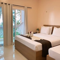 Quarto, vista para a praia | Wi-Fi de cortesia, roupa de cama