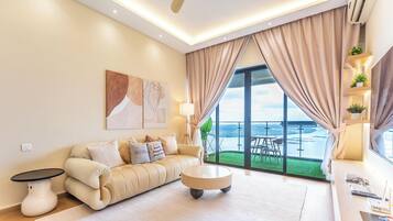 Apartamento Exclusivo, 3 quartos | Sala de estar | Smart TV de 55 polegadas com canais por cabo, Netflix