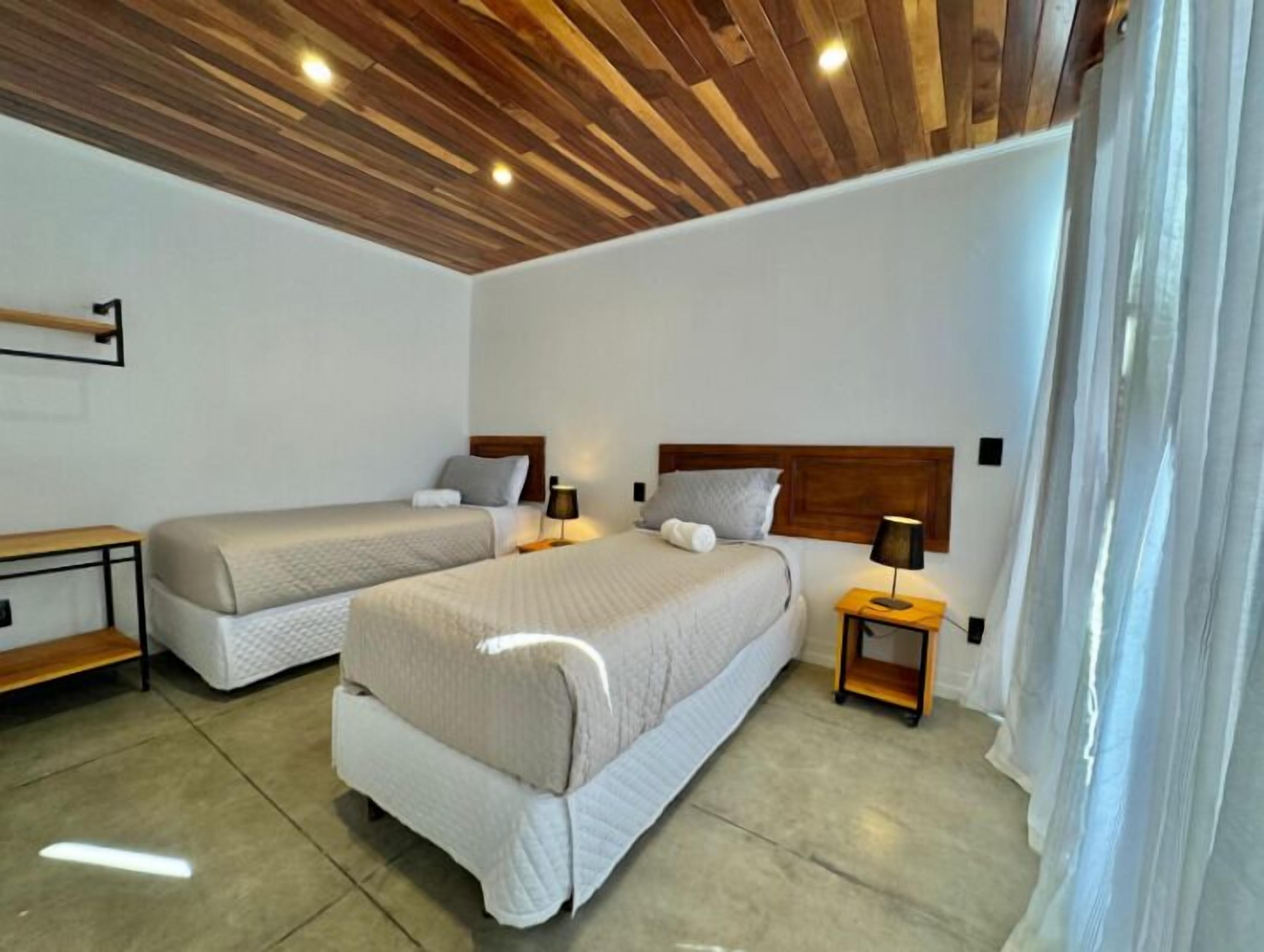 Quarto Deluxe | Roupa de cama fornecida 