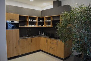 Apartamento Exclusivo | Cozinha privada | Uma cadeira de bebé 