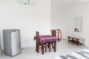 Quarto conforto | Área de estar | TV LCD