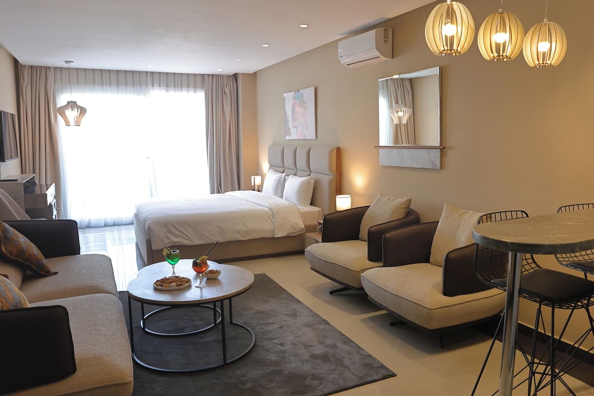 Suite Deluxe | Roupa de alta qualidade, edredões de penas 