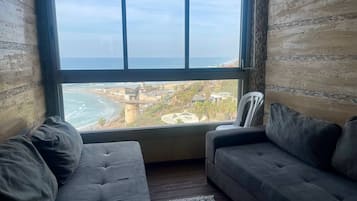 Apartamento Panorâmico | Secretária, cortinas/cortinados opacos, quartos insonorizados