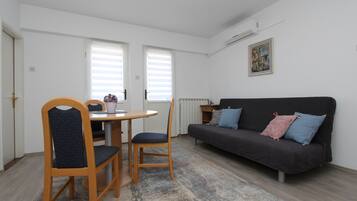 Apartamento, 1 quarto | Área de estar