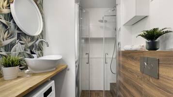 Apartamento conforto | Banheiro | Toalhas de banho