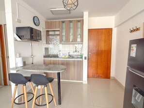 Apartamento exclusivo | 1 quarto, escrivaninha, ferros/tábuas de passar roupa, Wi-Fi de cortesia