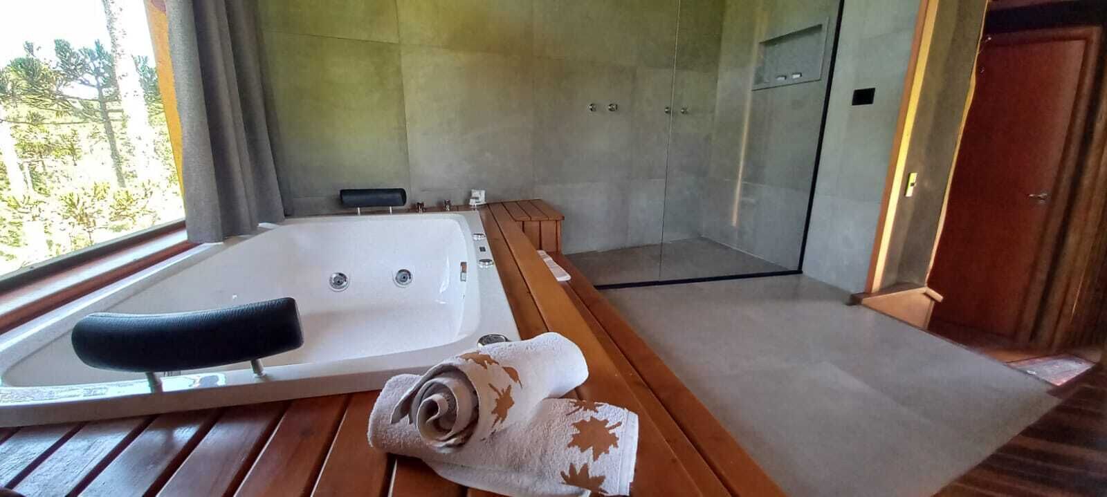 Cabana luxo, vista para o jardim | Frigobar, escrivaninha, Wi-Fi de cortesia, roupa de cama