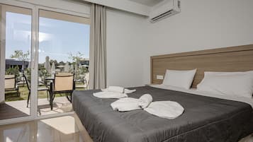 Apartamento família | 1 quarto, cofres nos quartos, Wi-Fi de cortesia, roupa de cama