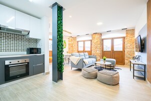 Apartamento Executivo | Sala de estar | Smart TV de 40 polegadas com canais digitais 