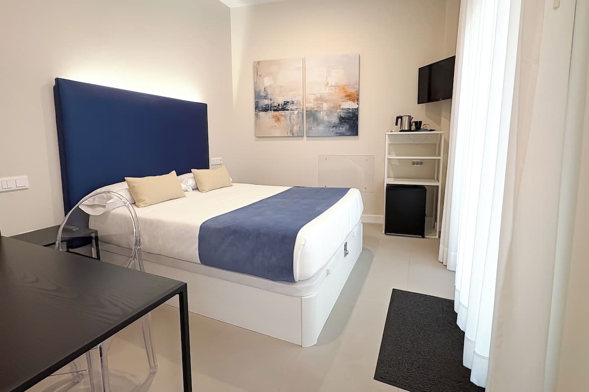 Quarto casal premium | Frigobar, individualmente decorados, individualmente mobiliados
