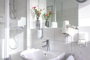 Quarto Comfort | Casa de banho | Um secador de cabelo
