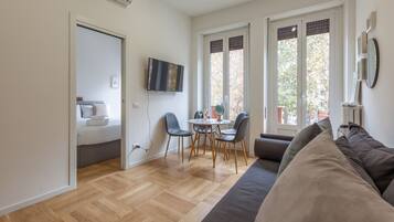 Comfort Apartment Via Solari 2a | Sala de estar | Televisor de ecrã plano de 50 polegadas com canais via satélite