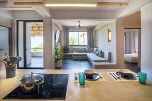 Apartamento Premier, 2 quartos, ar condicionado, vista para o oceano | Cozinha privada | Um frigorífico/congelador grande, uma cafeteira/bule 