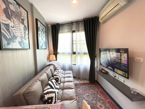 Apartamento clássico, 1 cama Queen, sacada | Área de estar