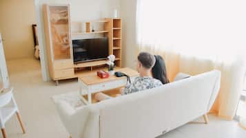 Apartamento Comfort | Sala de estar | Televisor LCD, Netflix, serviços de streaming