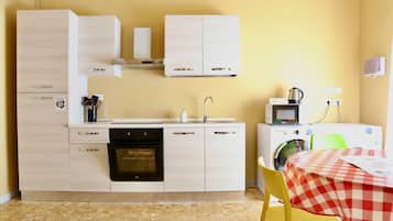 Apartamento | Cozinha privada | Uma chaleira elétrica