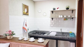 Minibar, cortinas/cortinados opacos, ferro/tábua de engomar 