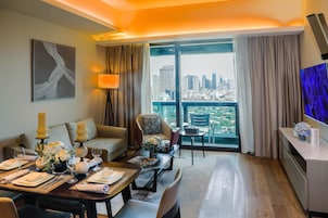 Quarto executivo, 1 cama King (One Bedroom Executive Suite) | Área de estar