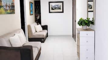 Quarto casal família | Área de estar