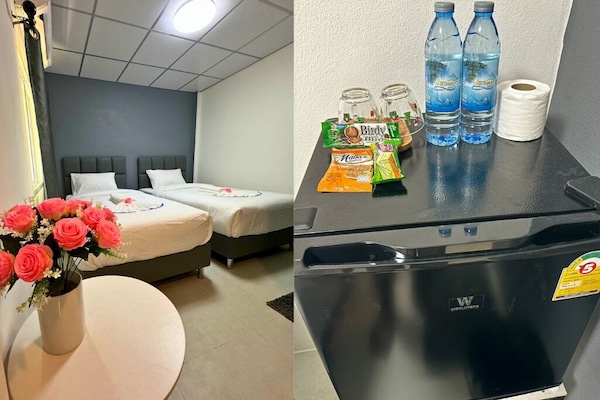 Quarto Twin Básico | Minibar grátis, cortinas/cortinados opacos, ferro/tábua de engomar