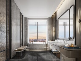 Casa de banho moderna com uma banheira grande, duas pias e vista para a cidade.