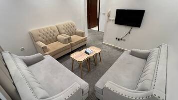 Apartamento família | Área de estar