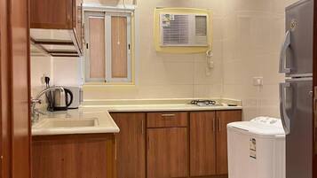 Apartamento família | Cozinha privada | Geladeira grande, micro-ondas, fogão